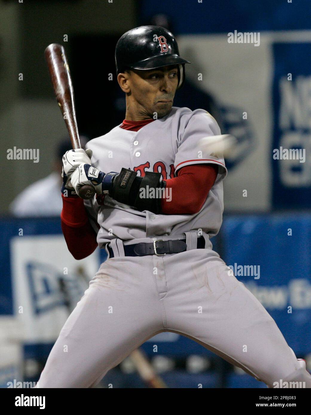 Boston Red Sox's Julio Lugo leans away from a brush-back pitch from ...