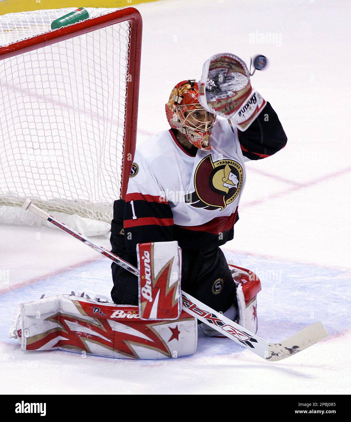 Ottawa Senators' goalie Ray Emery makes a save against the New Jersey ...
