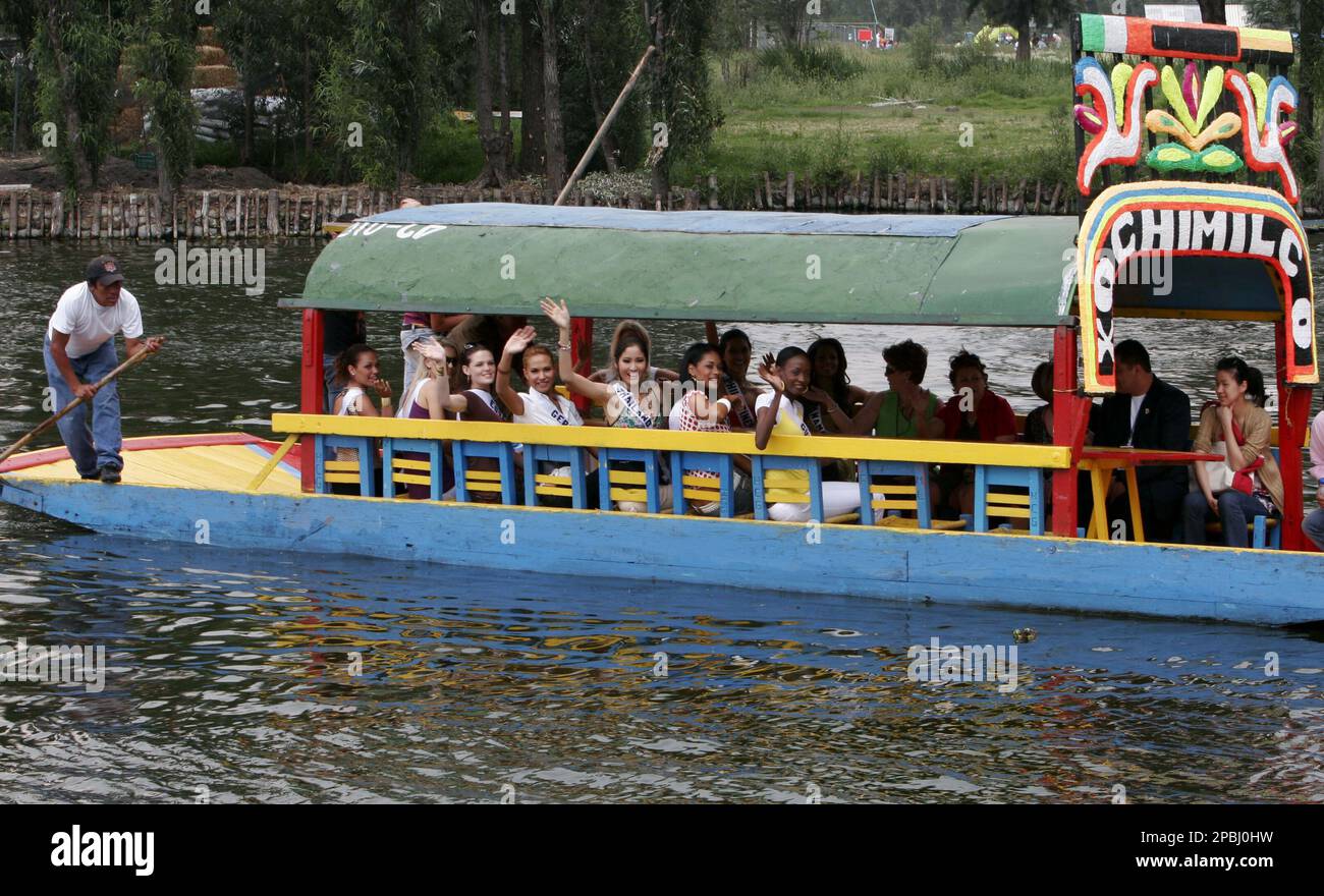 Miss Universe contestants take a boat tour during a visit to the ...