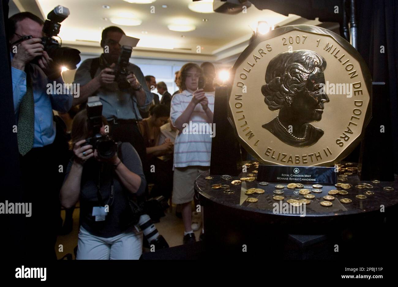 News photographers and invited guests take pictures of the Royal ...