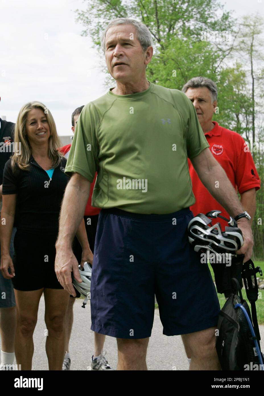 President Bush talks about physical fitness before going for a bike ...