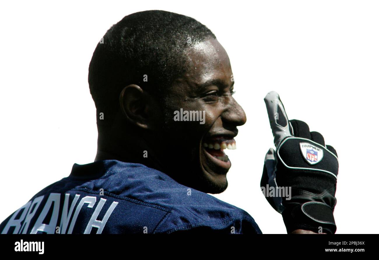 Seattle Seahawks wide receiver Deion Branch laughs during the first day ...