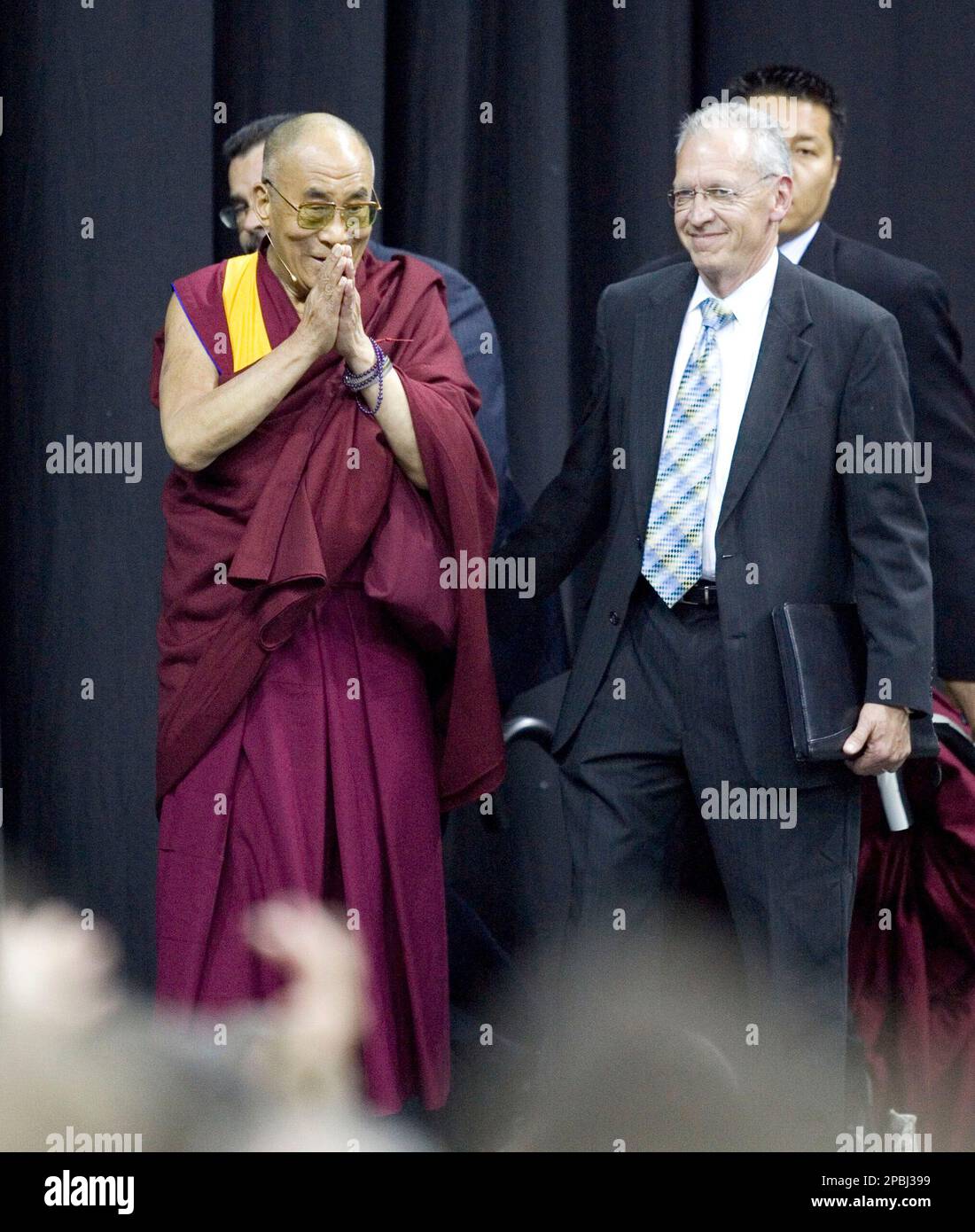 The Dalai Lama, the spiritual mentor to millions of Buddhists, walks on ...