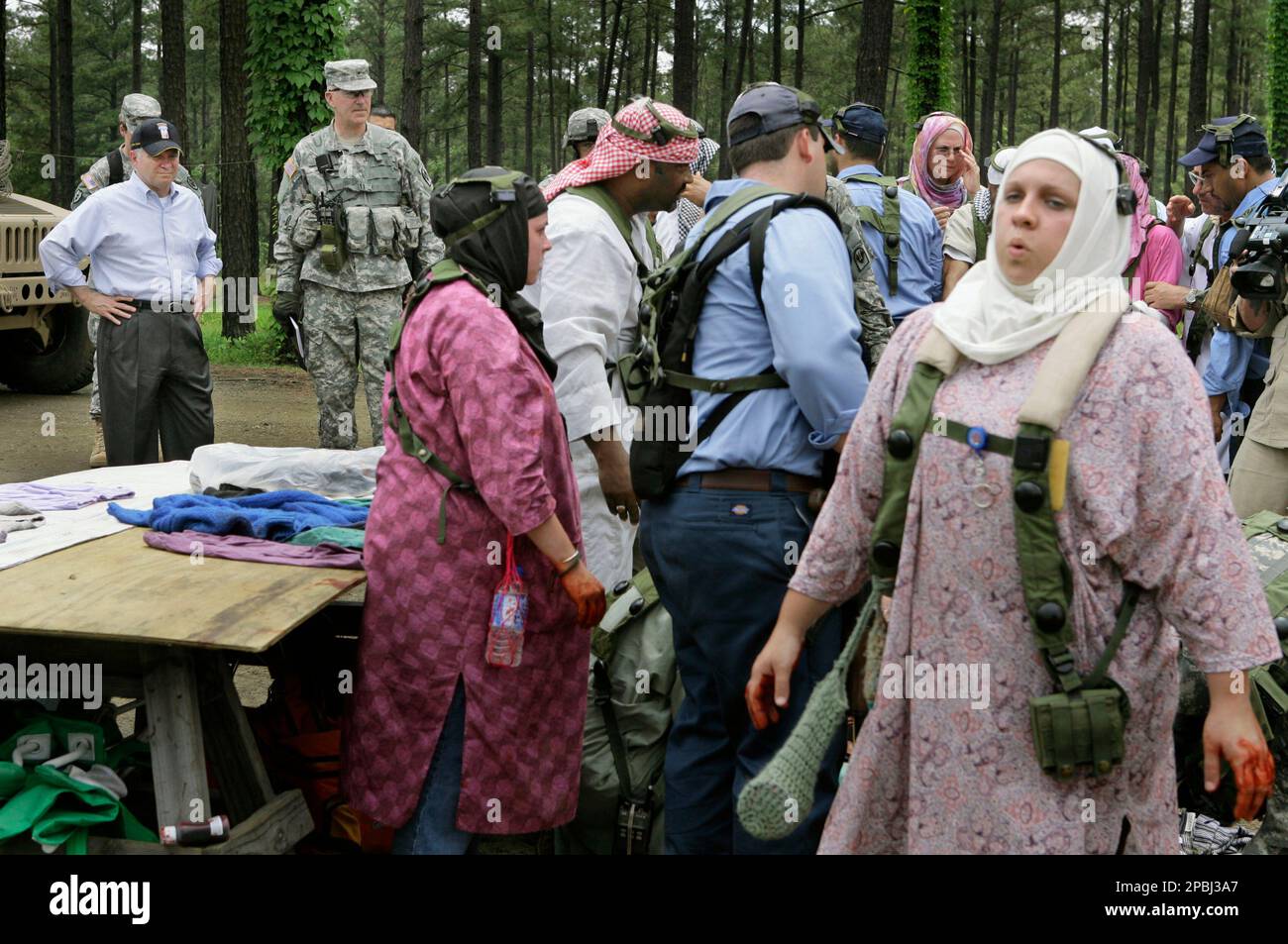 Secretary of Defense Robert Gates left, with Brig. Gen. Daniel Bolger ...