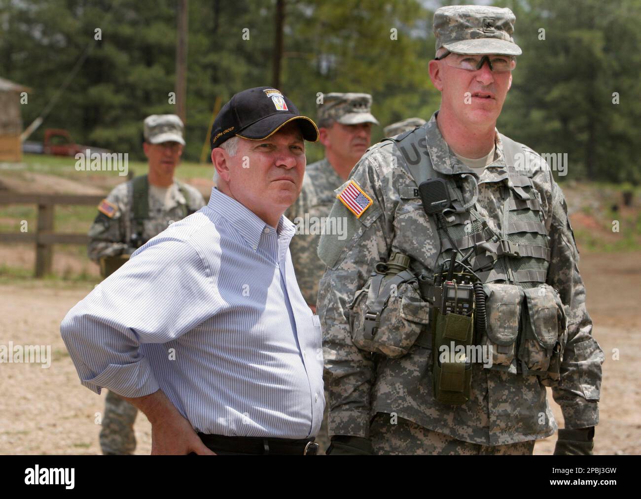 Secretary of Defense Robert Gates left, with Brig. Gen. Daniel Bolger ...