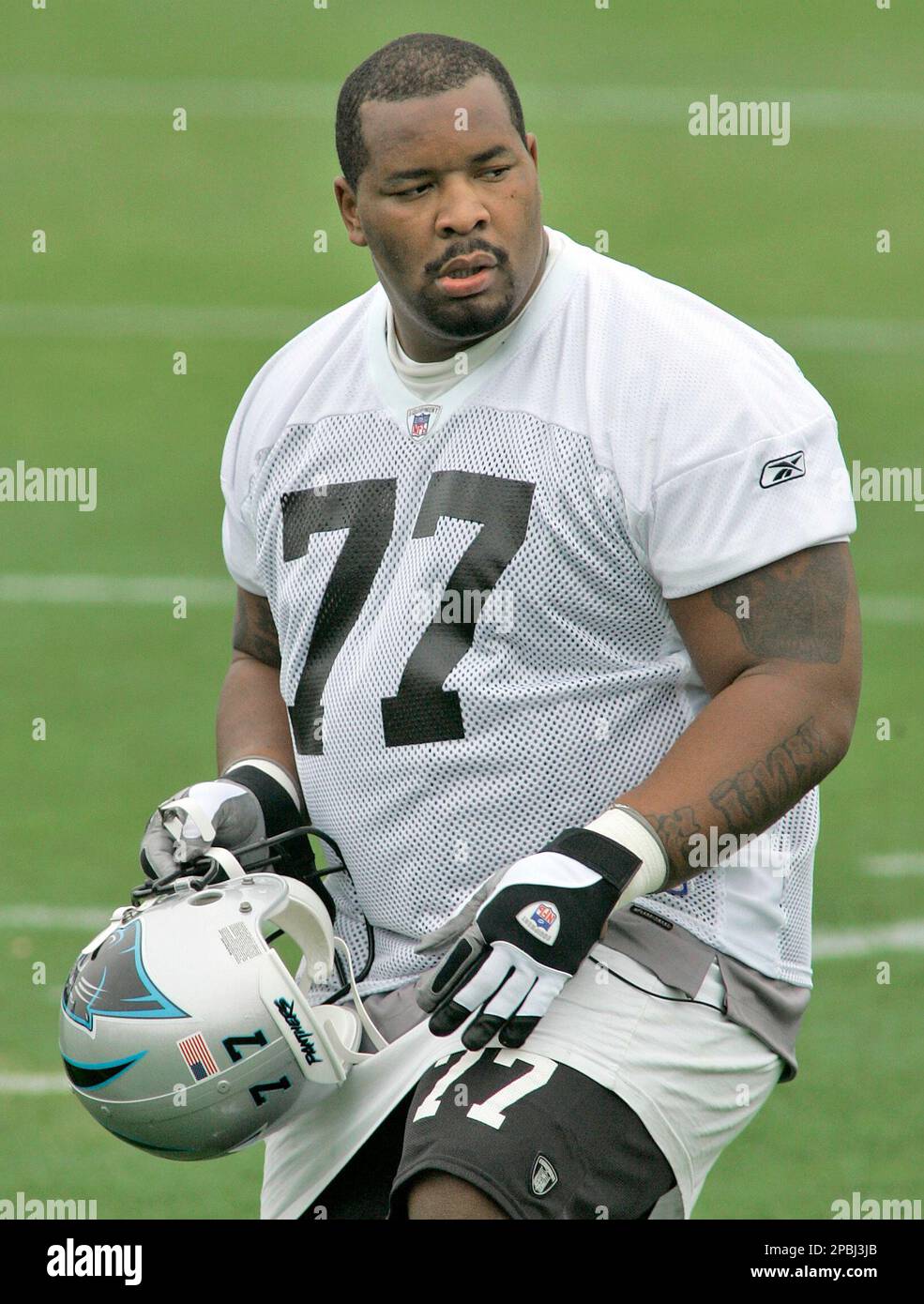 Carolina Panthers tackle Chris Jenkins watches the action during the ...
