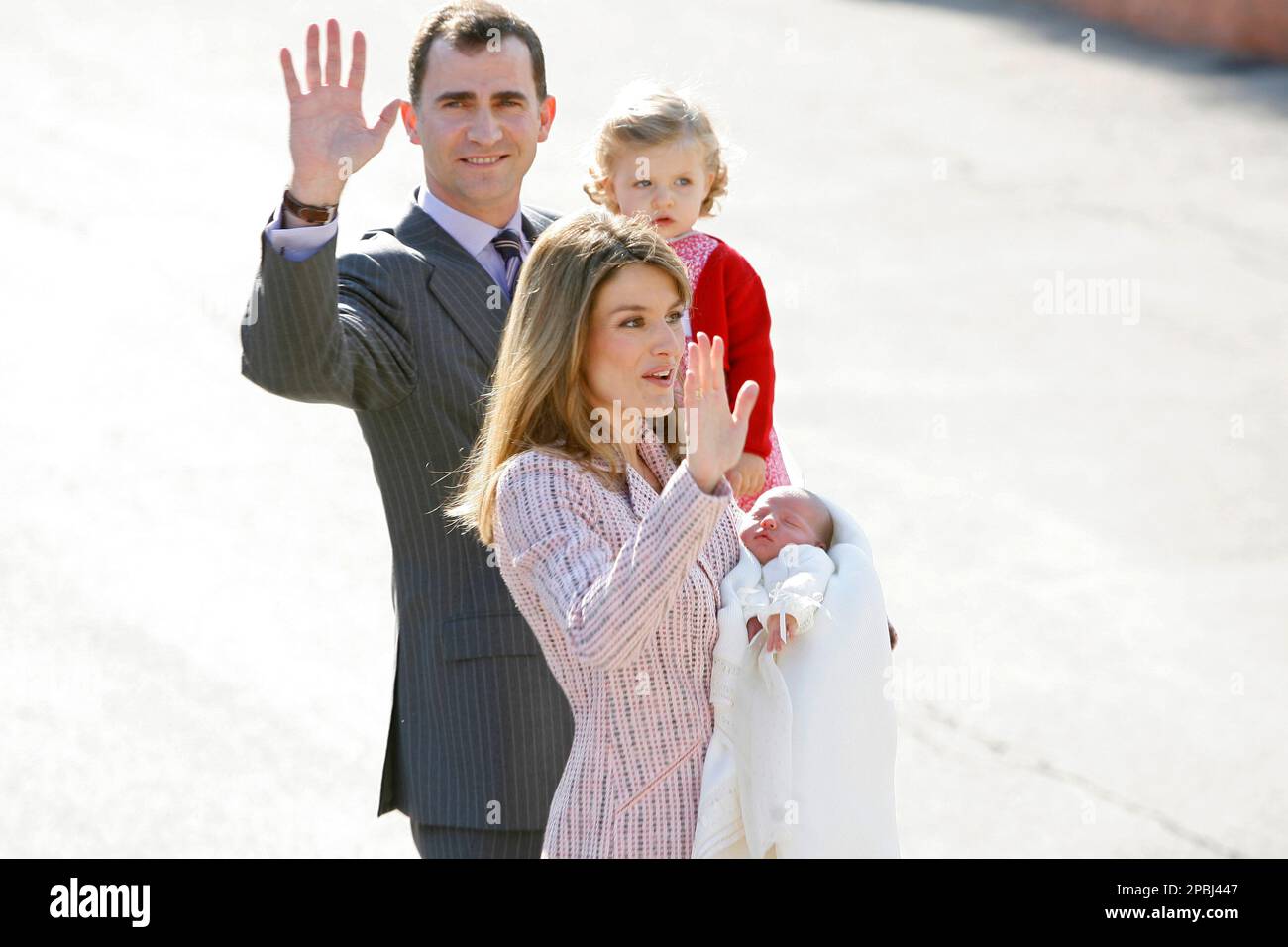 Spain Crown Prince Felipe, left holding Princess Leonor, and his wife ...