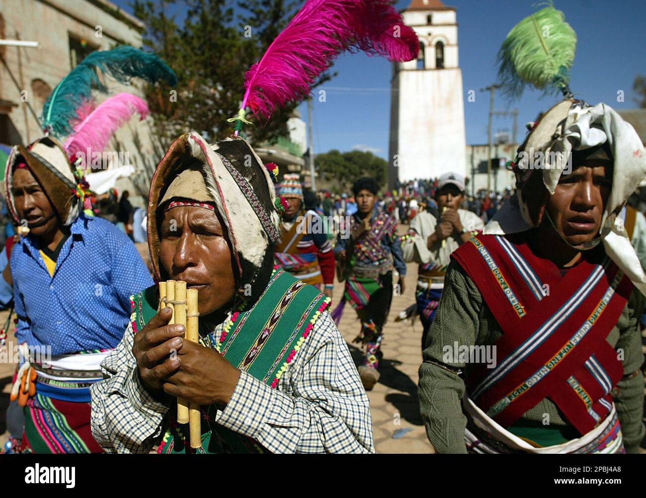 Quechua indigenous people play traditional Andean music during ...