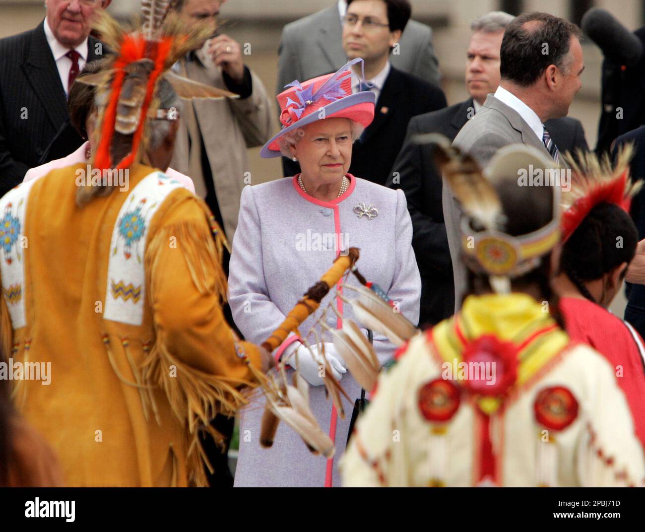 Queen Elizabeth II watches an American Indian dance while visiting the ...