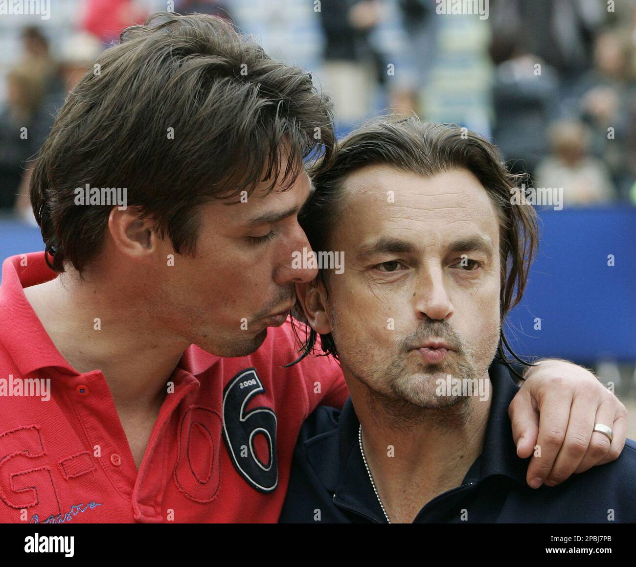 Former French tennis ace Henri Leconte, right, and former tennis player ...