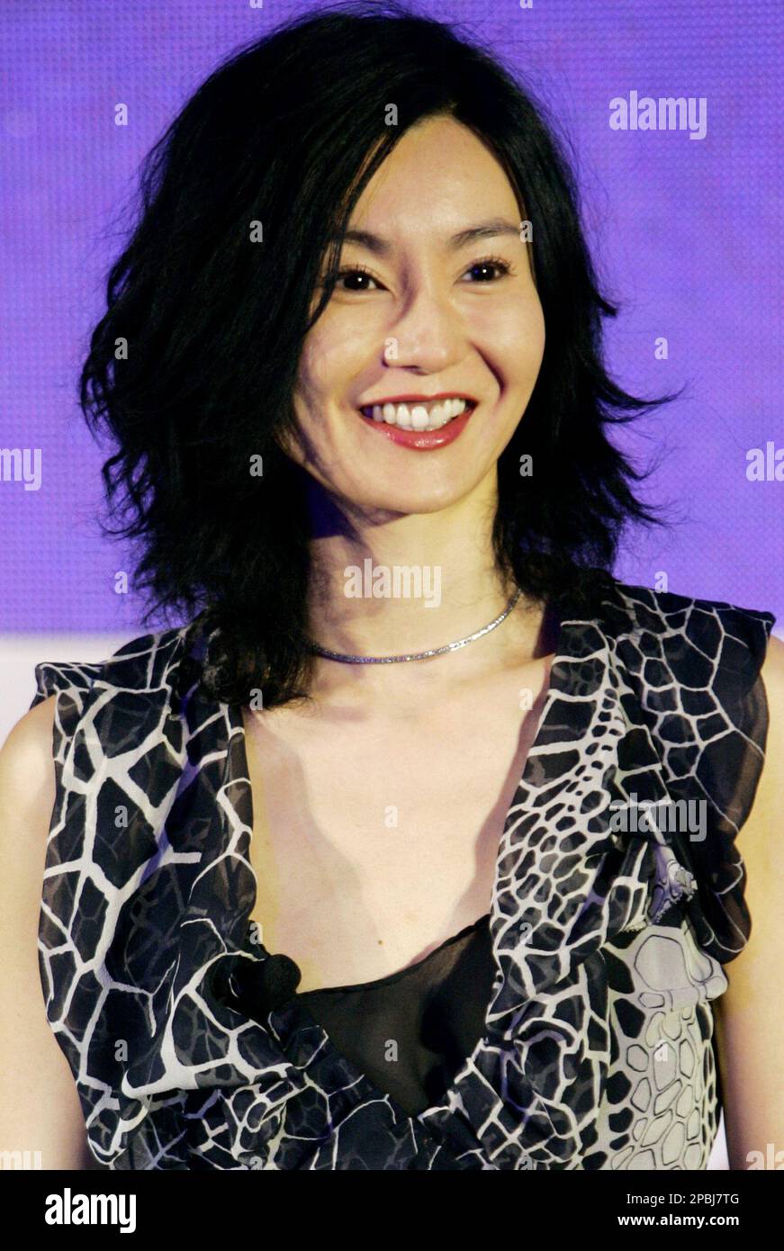 Hong Kong movie star Maggie Cheung attends the ribbon cutting at HSBC ...