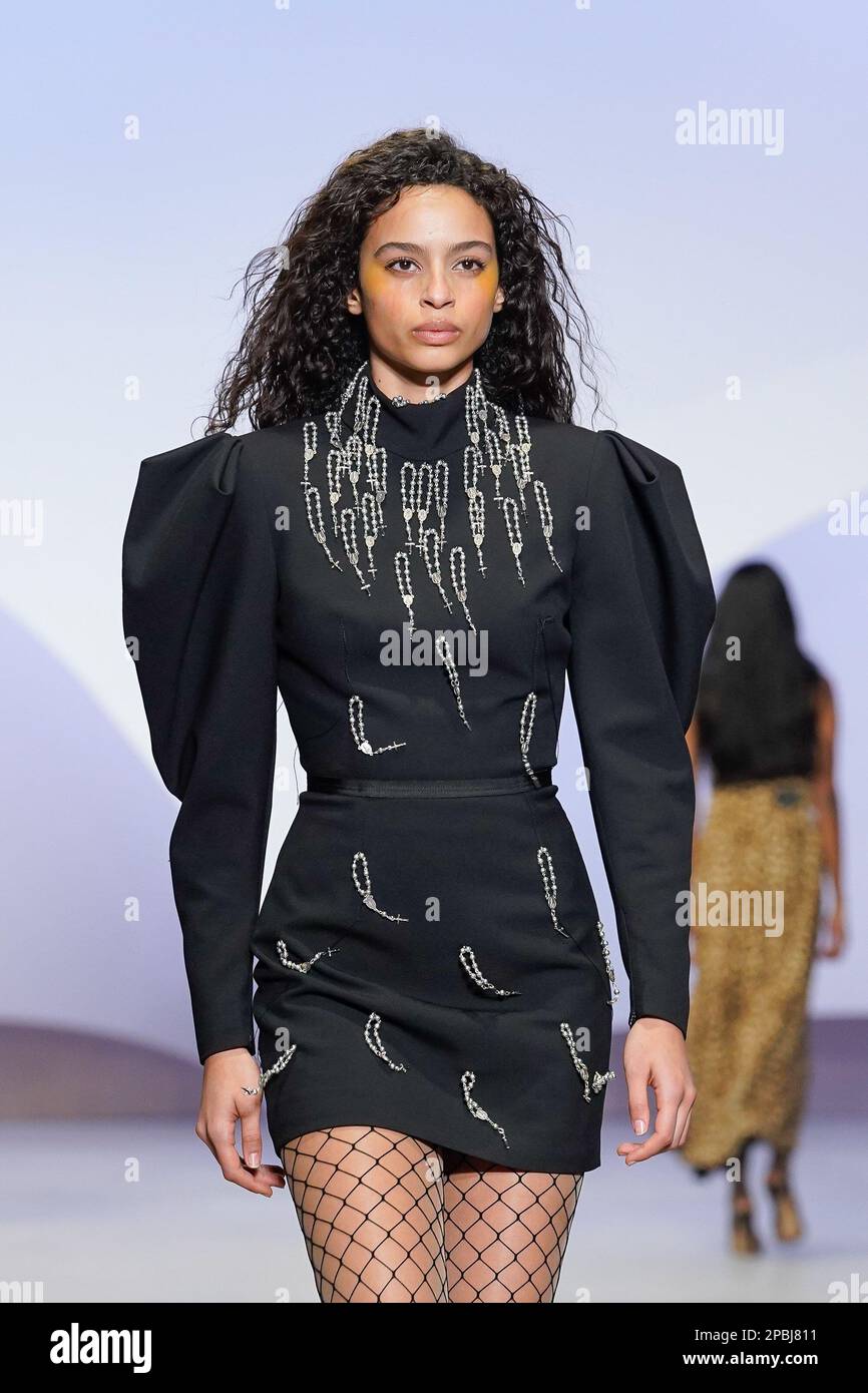 Lisbon, Portugal. 12th Mar, 2023. A model walks the runway at the Nuno ...