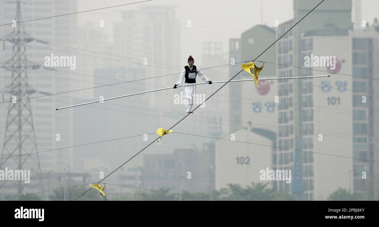 South Korea's Kwon Won-tae walks a high wire during the 1st World High ...