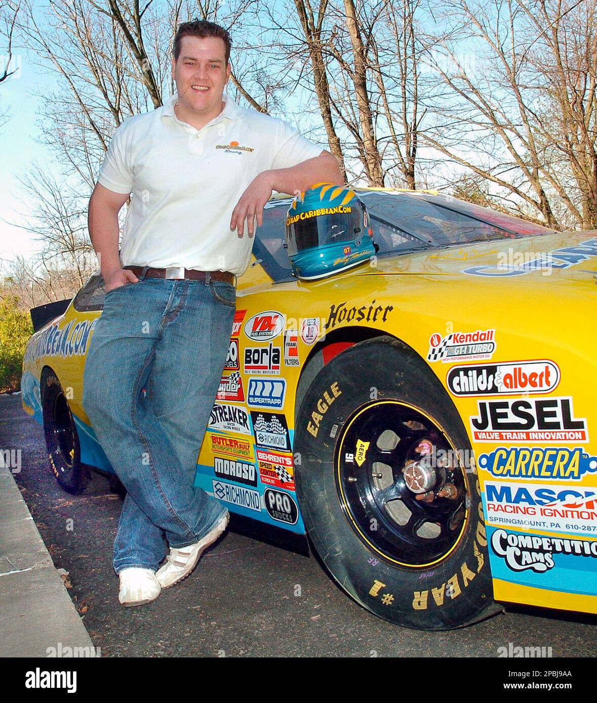 Billy Tanner poses with his racecar in the driveway of his Newtown, Pa ...