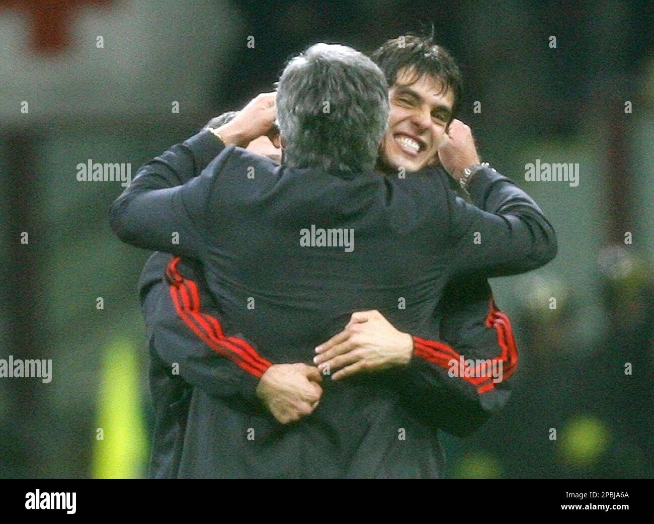Brazil's Kaka, right, and Milan coach Carlo Ancelotti embrace after ...