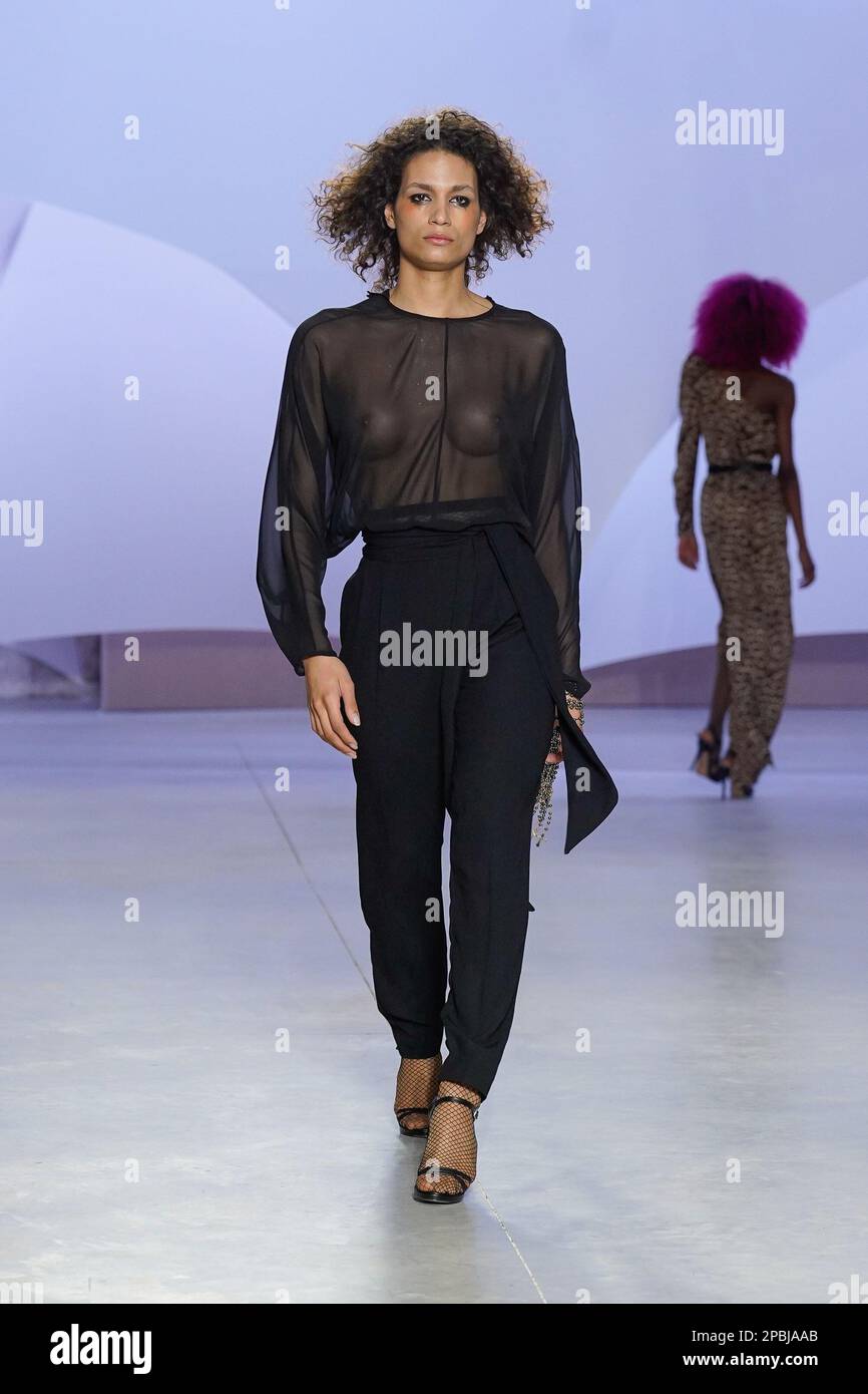 Lisbon, Portugal. 12th Mar, 2023. A model walks the runway at the Nuno ...