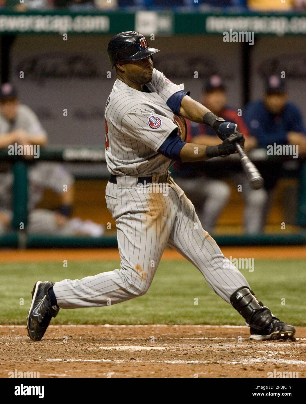Minnesota Twins' Torii Hunter hits a double against the Tampa Bay Devil ...