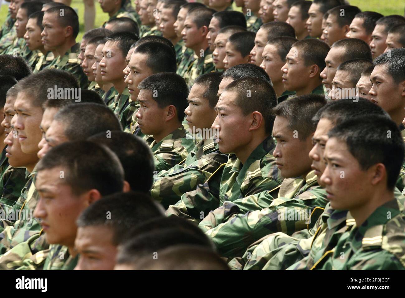 People's Liberation Army (PLA) officers sit during an open day at a ...