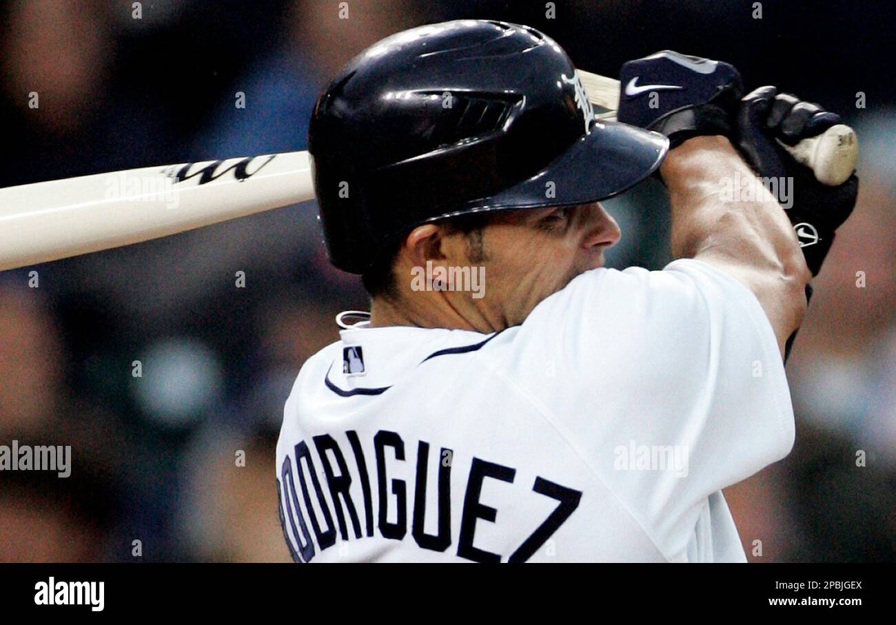 Detroit Tigers' Ivan Rodriguez breaks his bat while hitting into a ...
