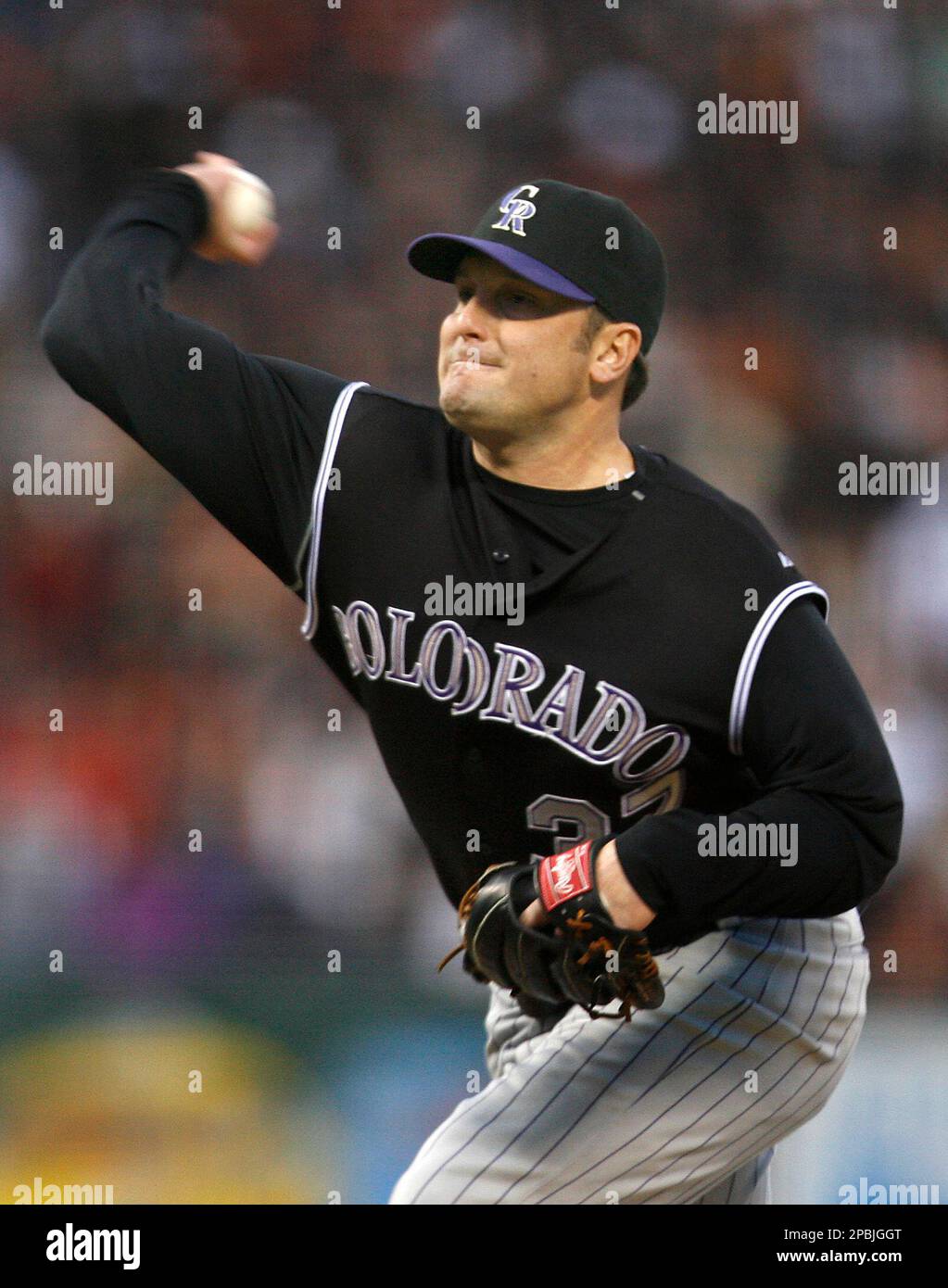 Colorado Rockies pitcher Josh Fogg pitches to the San Francisco Giants ...