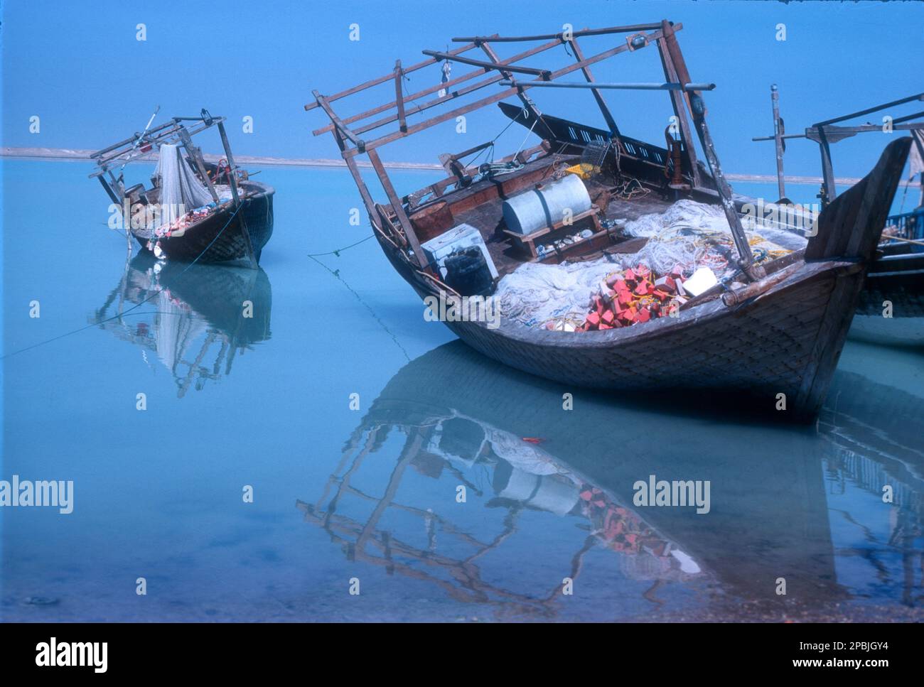Fishing boats moored in al-Ruwai north coast of Qatar, 1975 Stock Photo ...