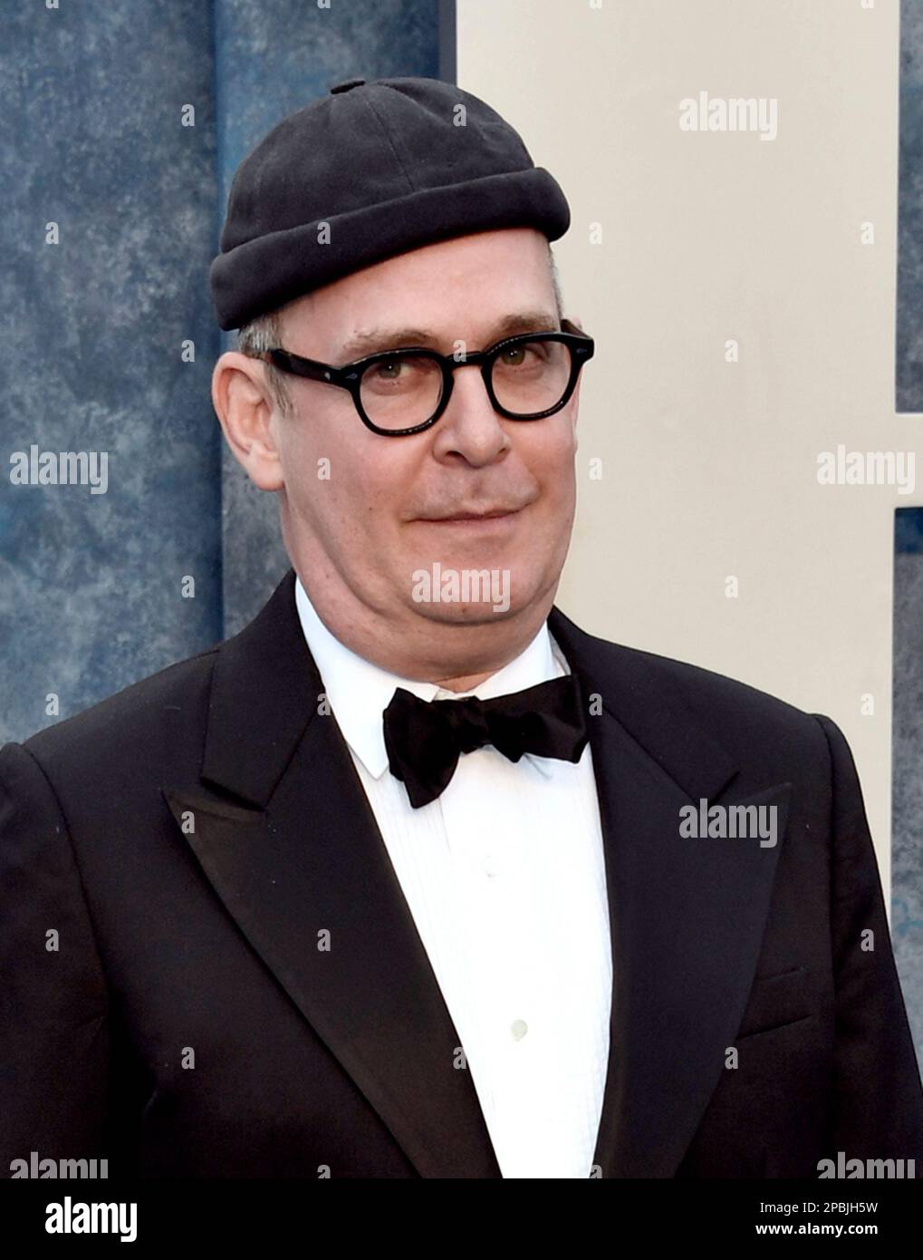 Tom Hollander arrives at the Vanity Fair Oscar Party on Sunday, March ...