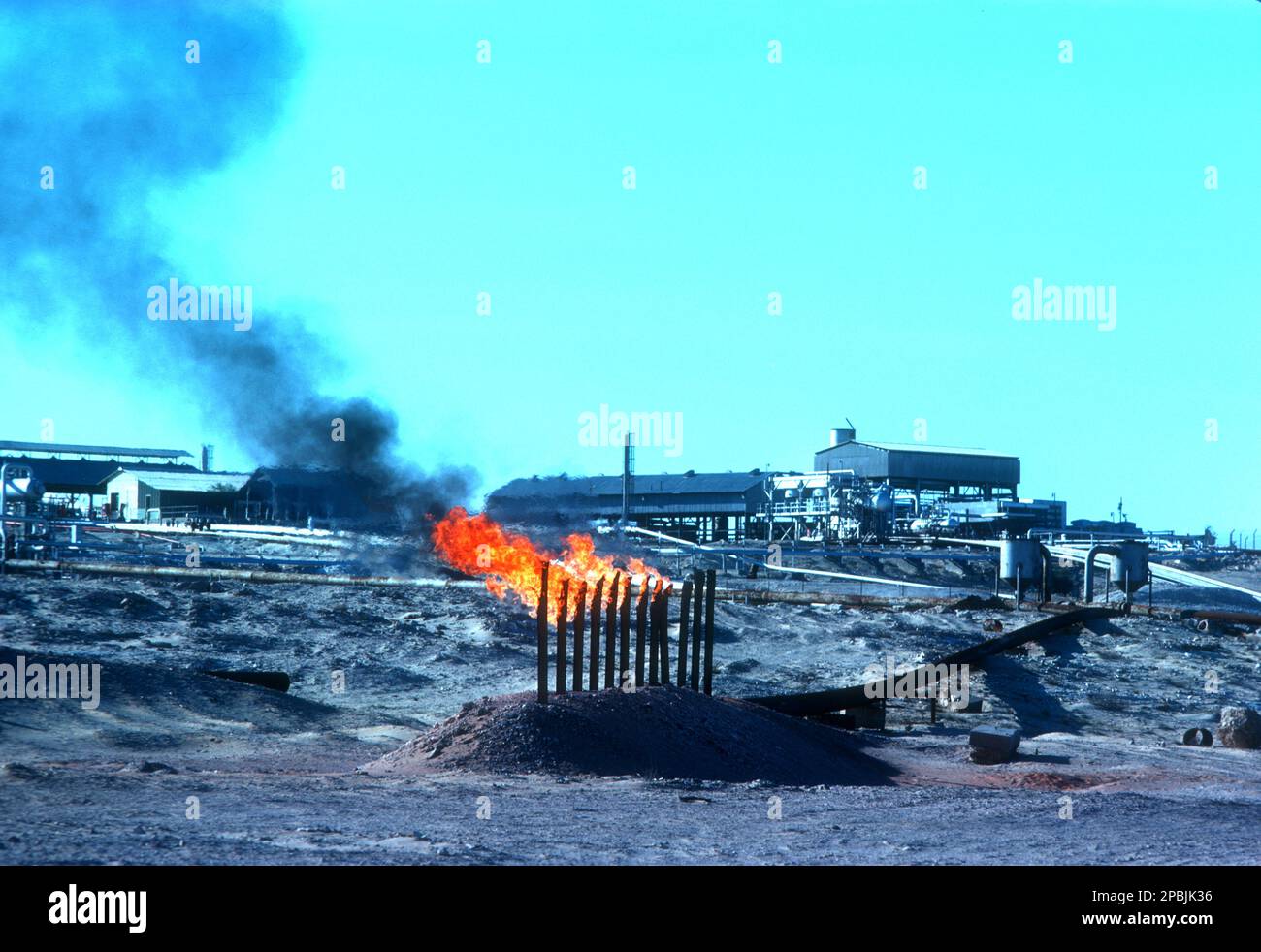 Flared waste gas, Dukhan field, Qatar, 1975 Stock Photo - Alamy