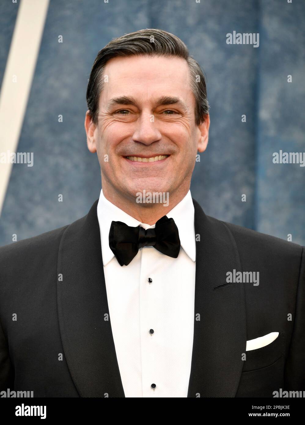 Jon Hamm arrives at the Vanity Fair Oscar Party on Sunday, March 12 ...