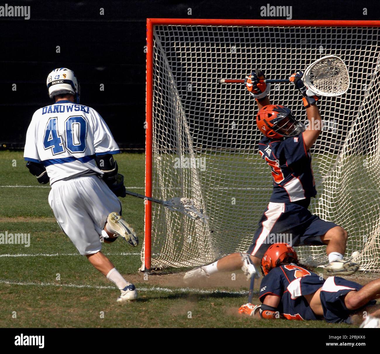 Duke's Matt Danowski (40) scores past Virginia's goalie Kip Turner and ...