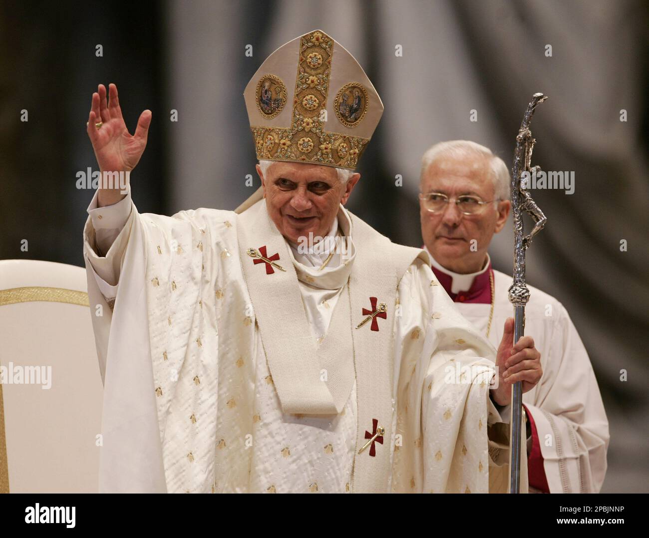 Pope Benedict XVI is flanked by Archbishop Piero Marini, Master of ...
