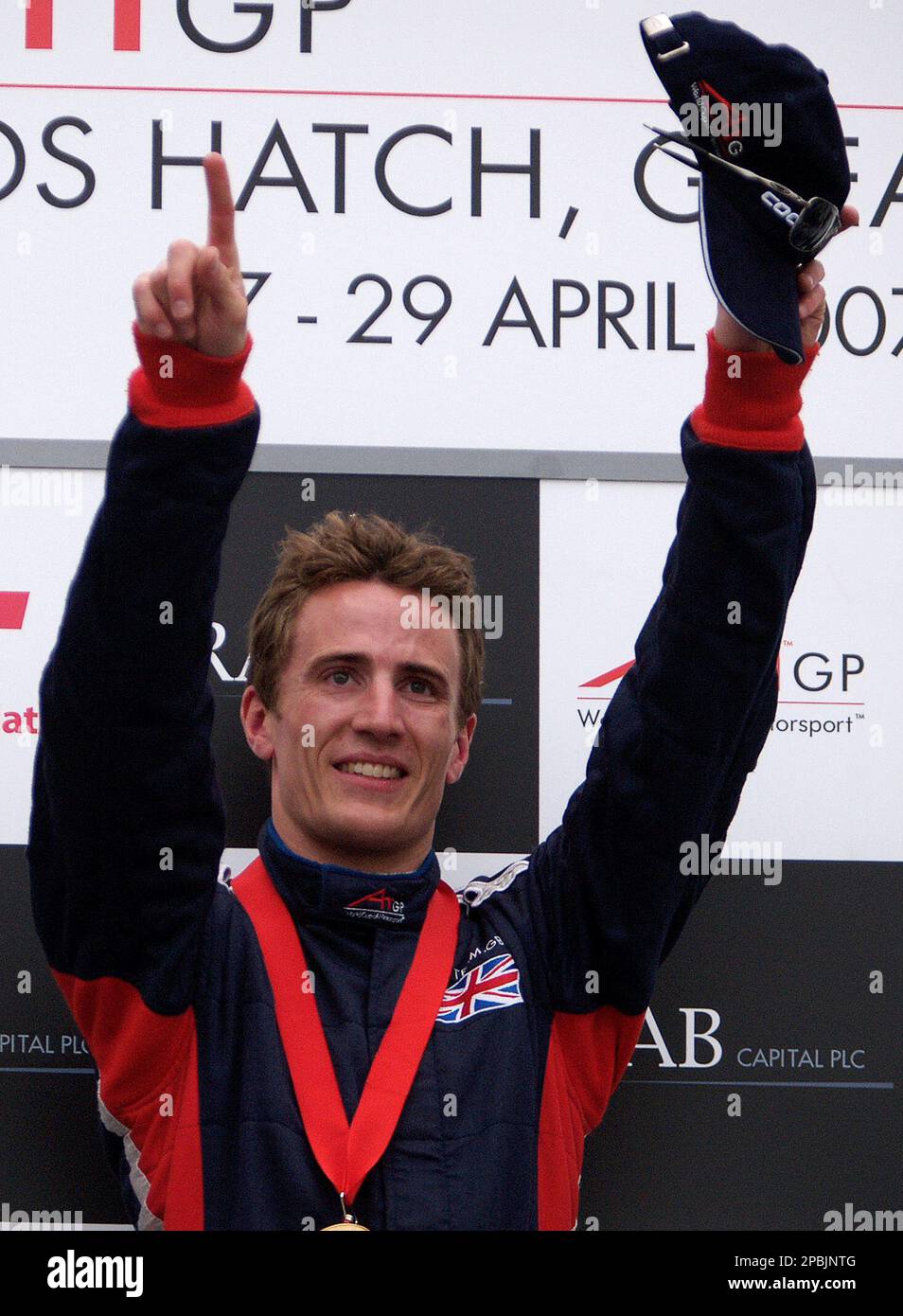 Britain's Robbie Kerr celebrates on the podium after he won the Sprint ...