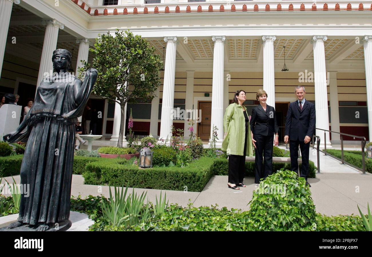 First lady Laura Bush, center, stands with with curator of antiquities ...