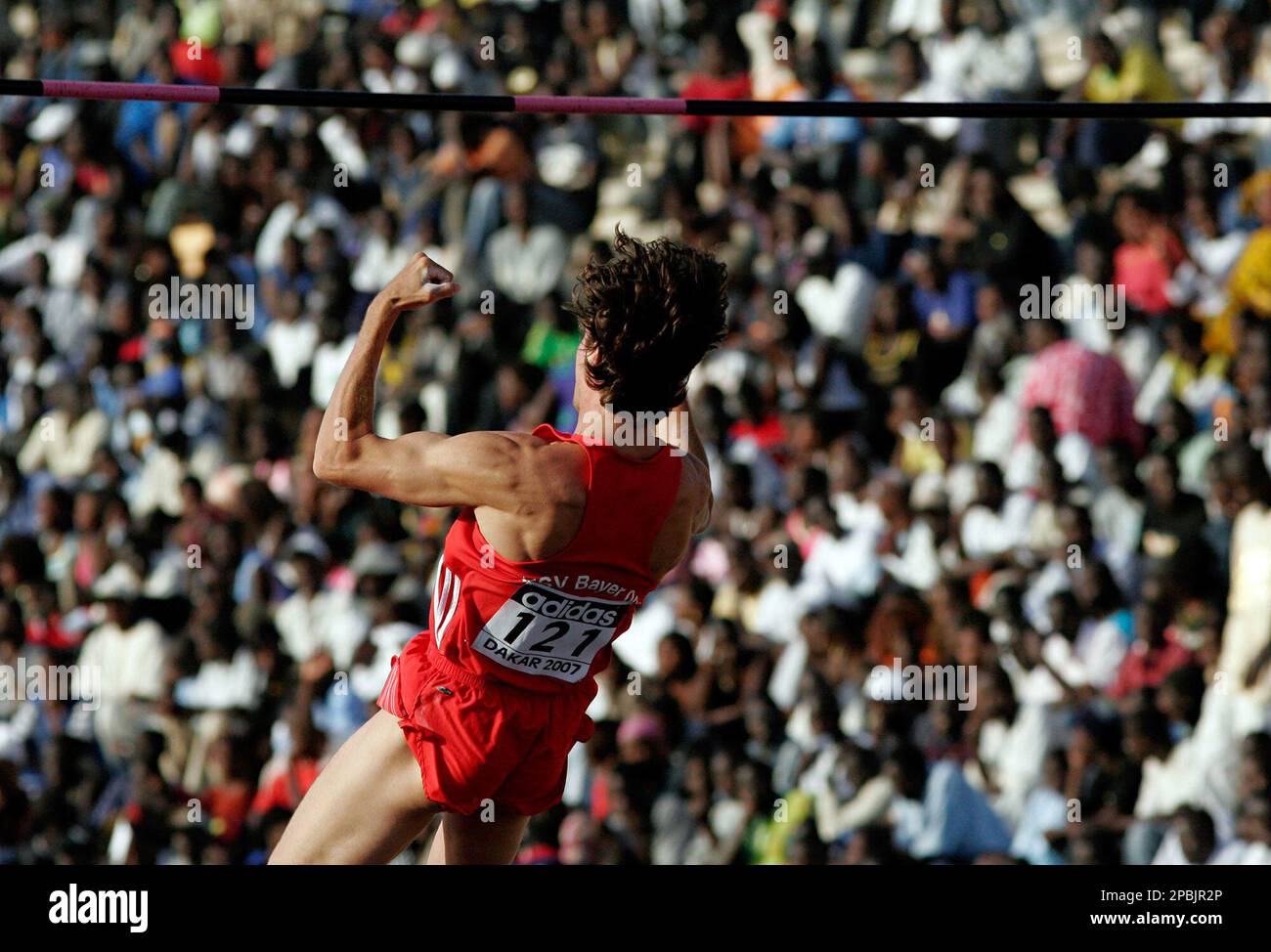 German pole vaulter Danny Ecker raises his arms in a cheer after a ...