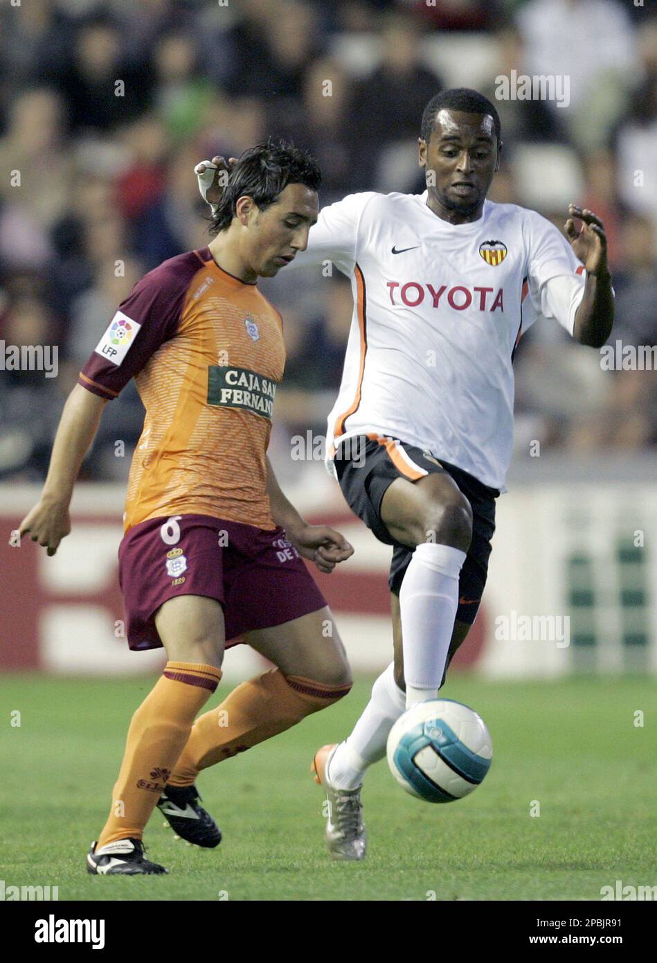 Valencia's Miguel Brito from Portugal, right, duels for the ball with ...