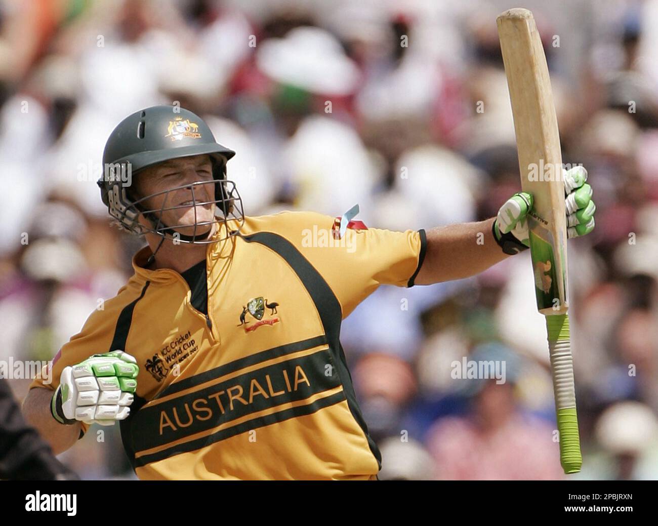 Australia's Adam Gilchrist celebrates making 100 runs against Sri Lanka ...