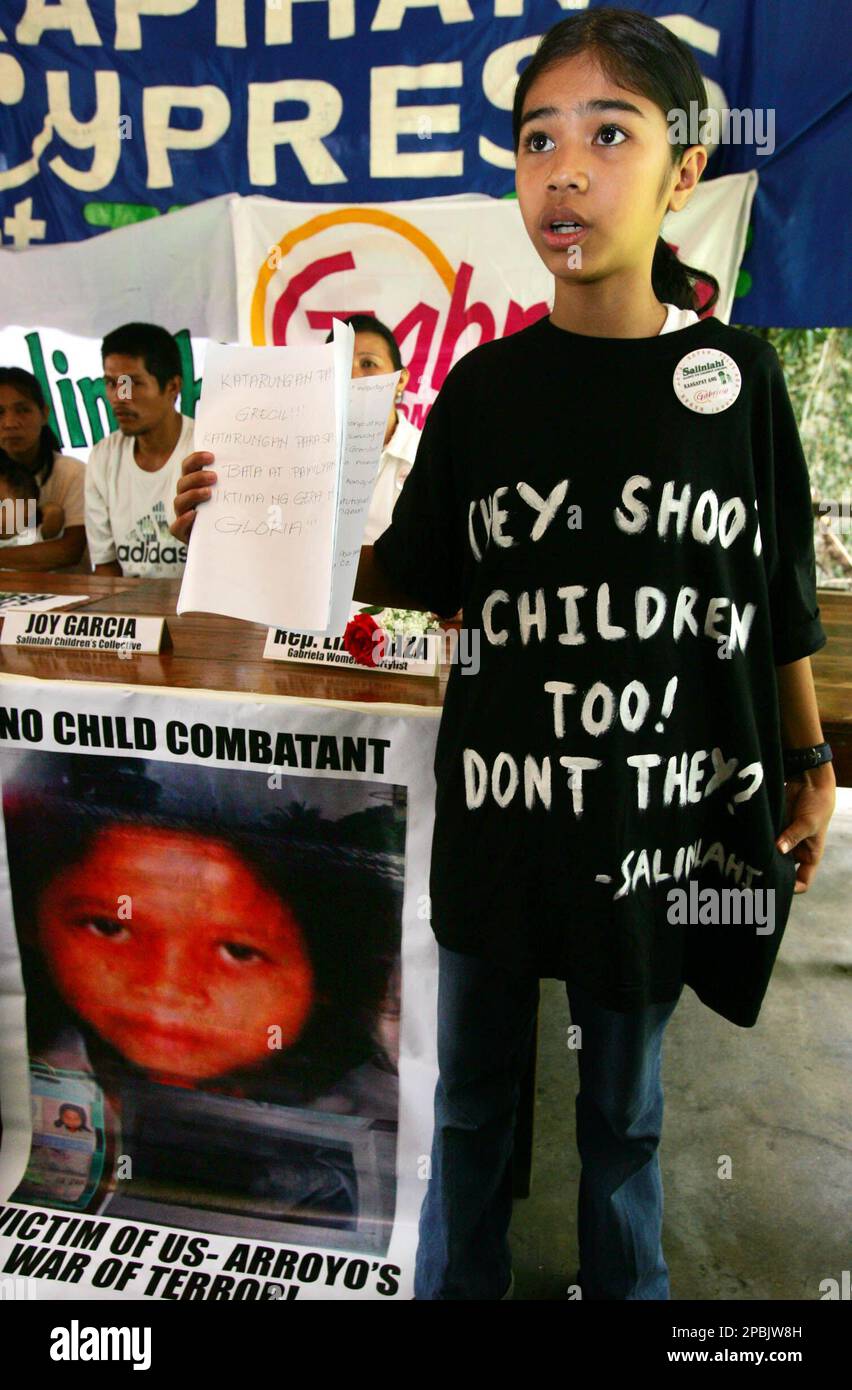 Joy Garcia, 13, reads her appeal for Philippine President Gloria ...