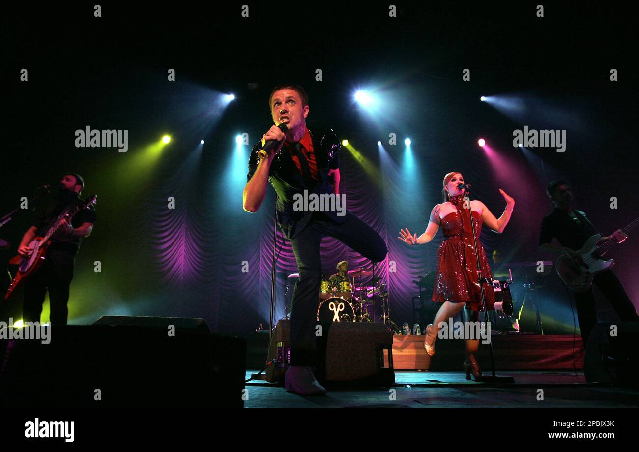 Scissor Sisters singer Jake Shears, foreground, performs during the ...