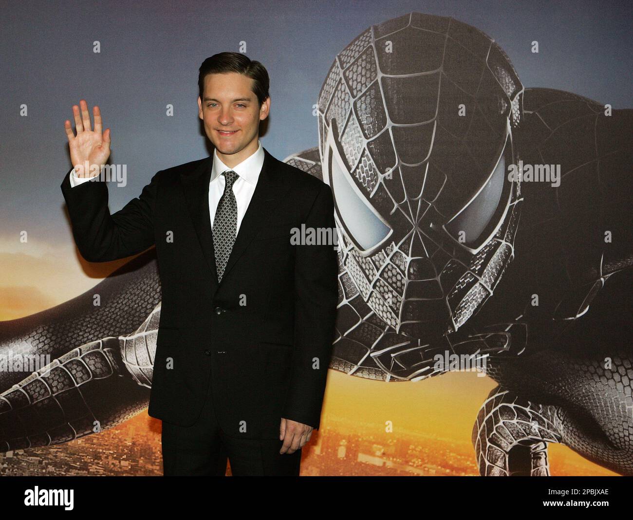 US actor Tobey Maguire poses for photographers as he stands in front of ...