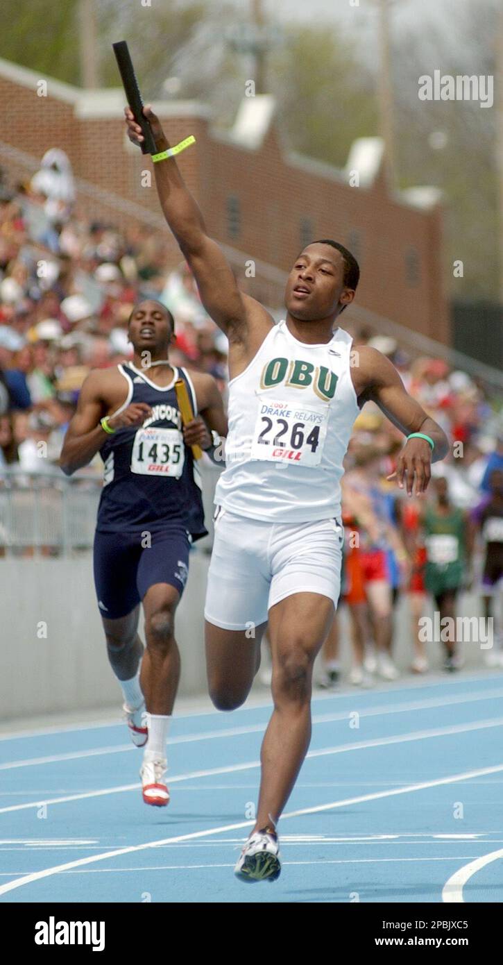 Oklahoma Baptist's Michael Rodgers celebrates after anchoring the men's ...