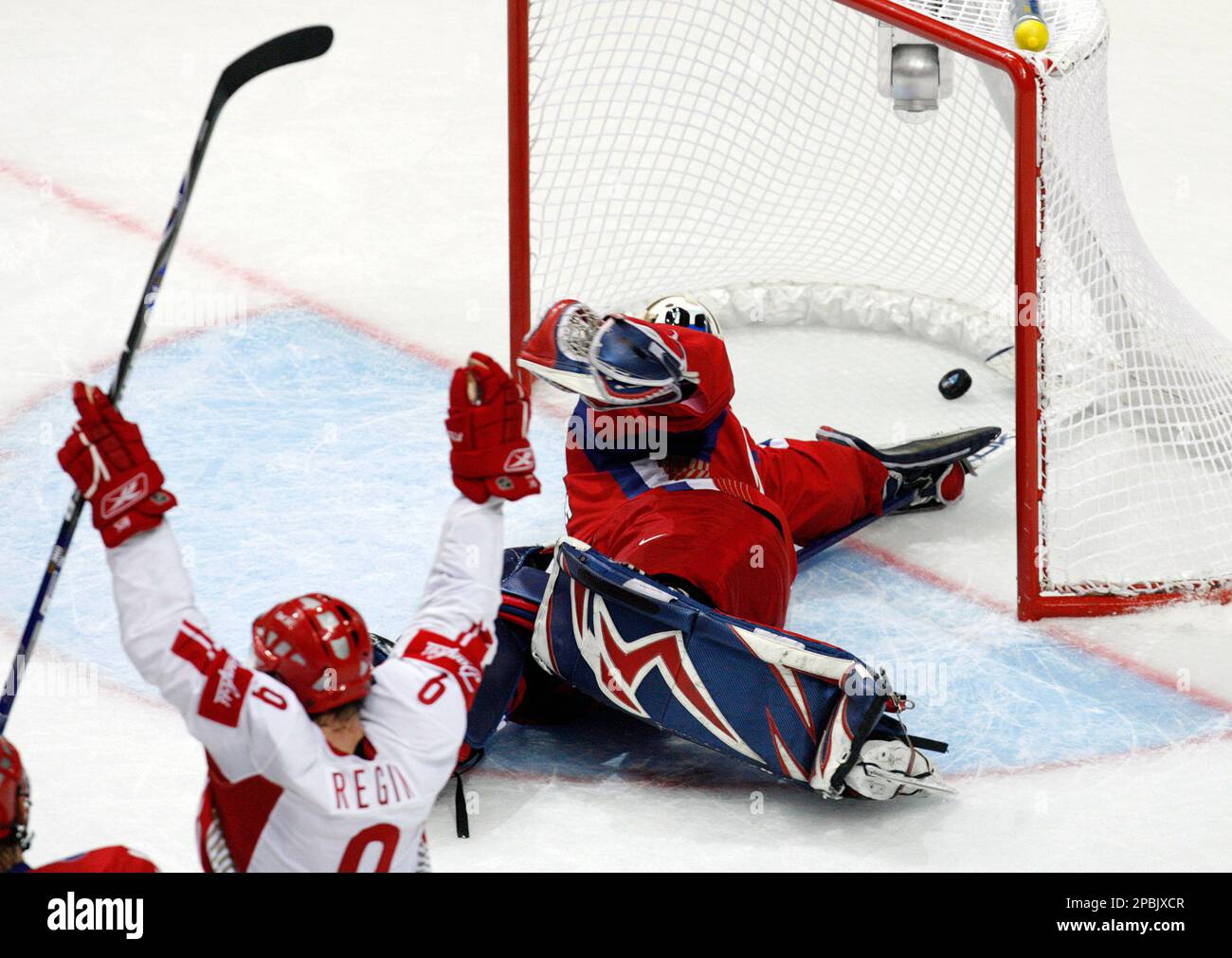 Denmark's Peter Regin scores against Russia's goalkeeper Vasiliy ...
