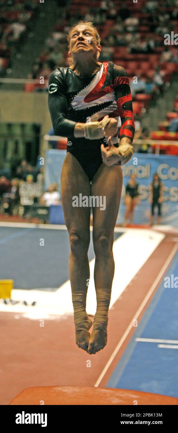 Georgia's Tiffany Tolnay competes in the vault during the NCAA women's ...