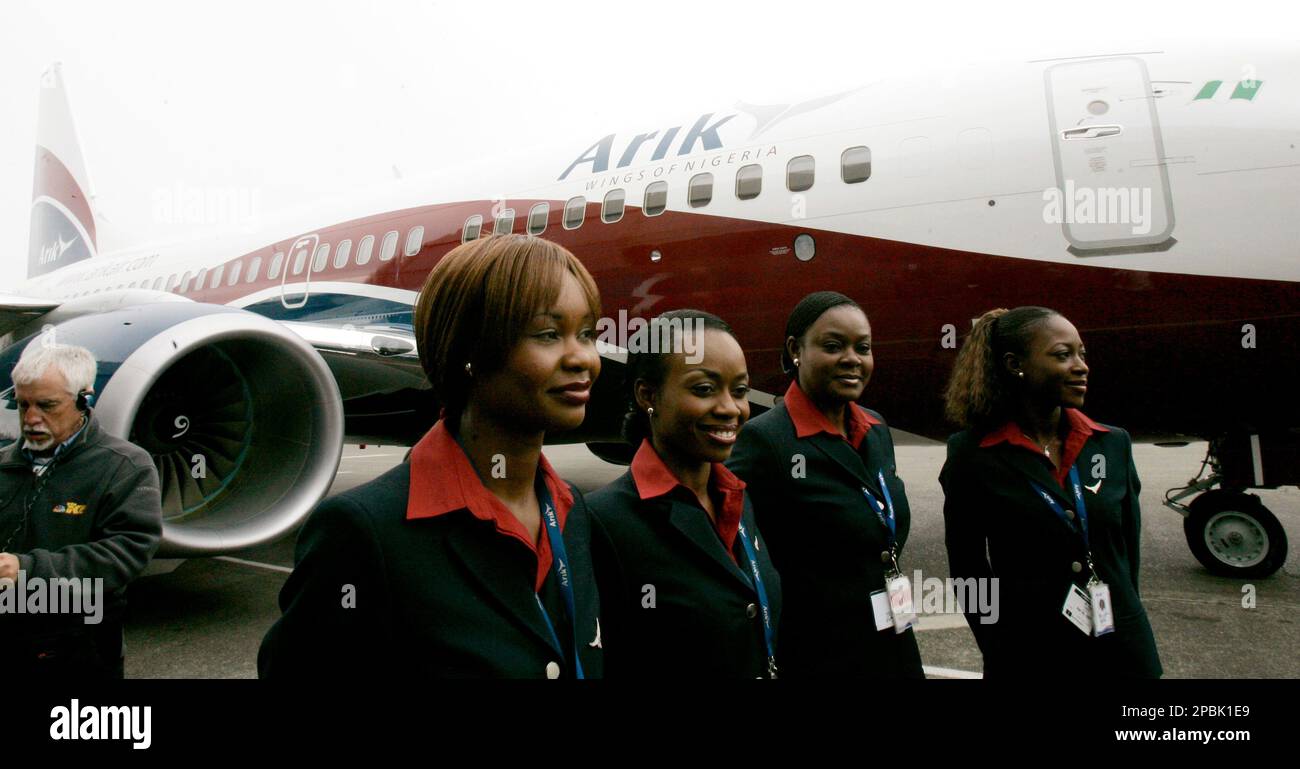 Cabin crew members with Nigeria-based Arik Air (from left) Asian Ubeng ...