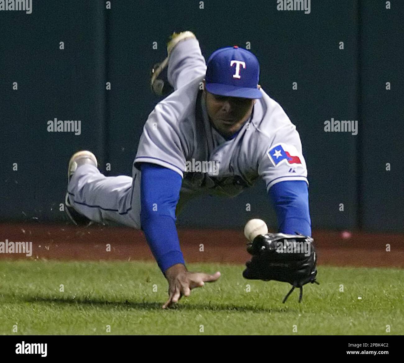 Texas Rangers' Nelson Cruz makes a diving attempt but can't make the ...
