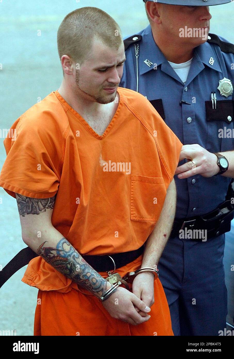 Corey Swift, 18, is led from a police car to make his first court ...