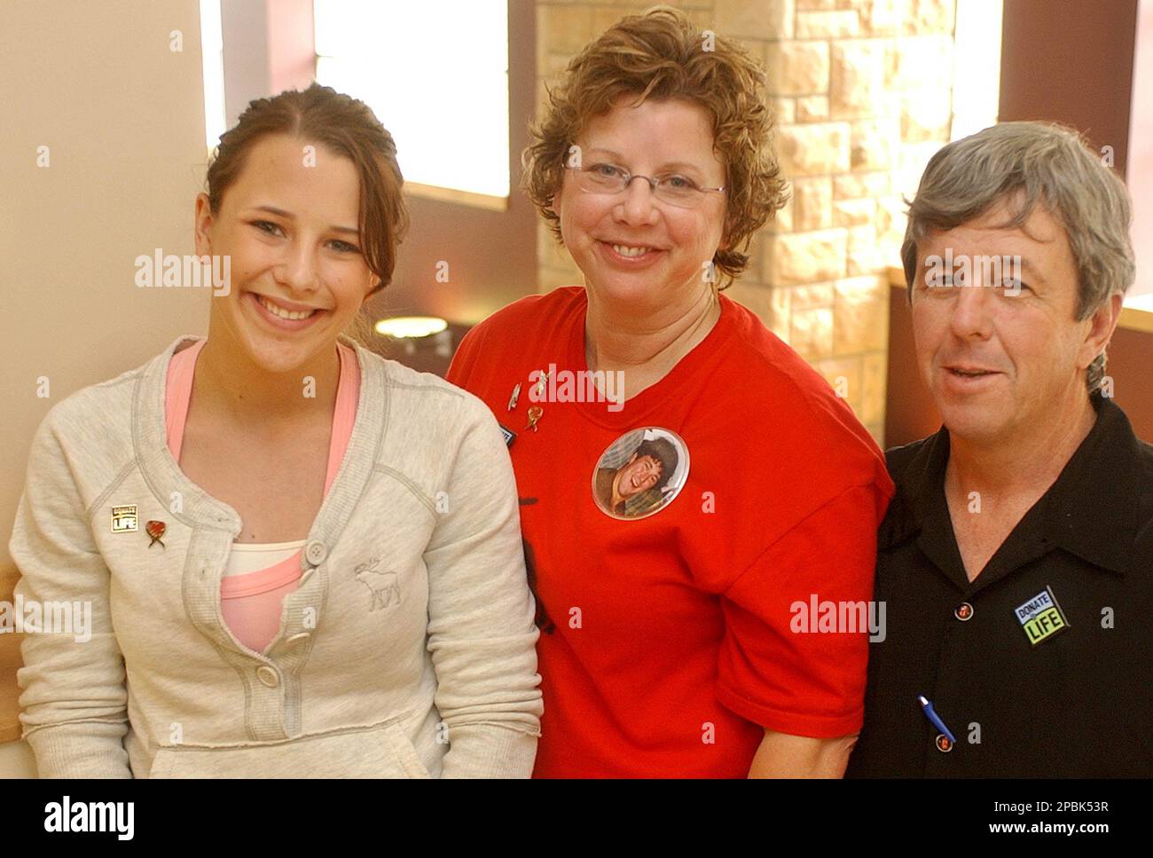 Alex Varney, 16, left, with her parents, Barb and Tiff Varney, pose for ...