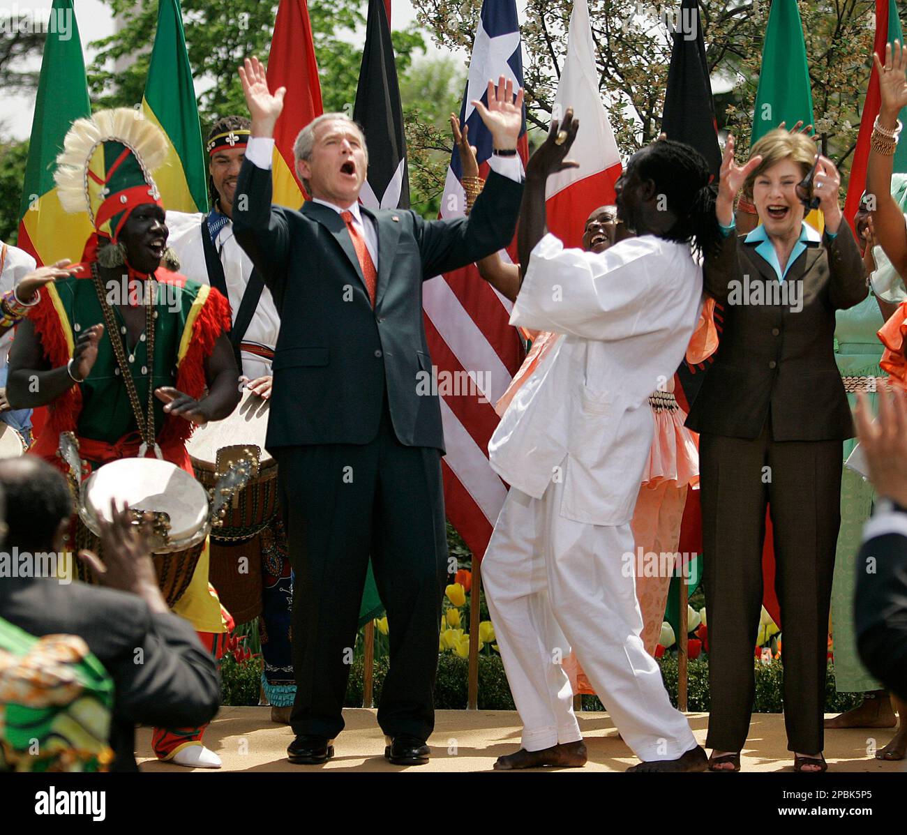 President Bush, second from left, and first lady Laura Bush, right ...