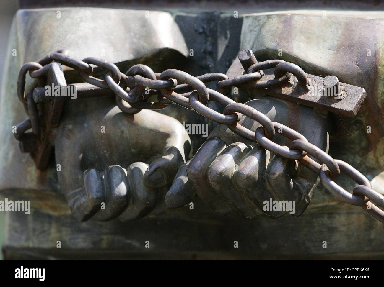 Hands chained, part of a monument in memory of those who fought and ...