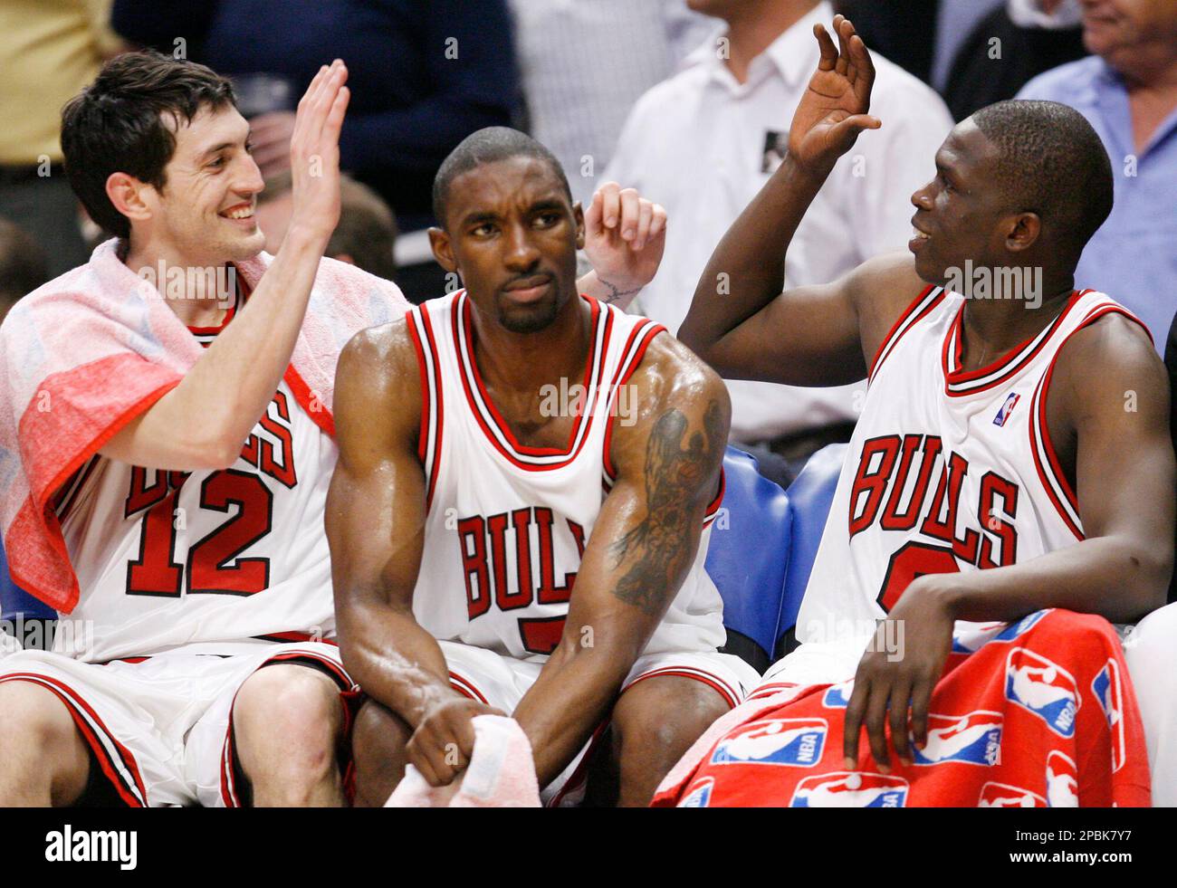 Chicago Bulls' Kirk Hinrich, left, and Luol Deng of Sudan, right ...