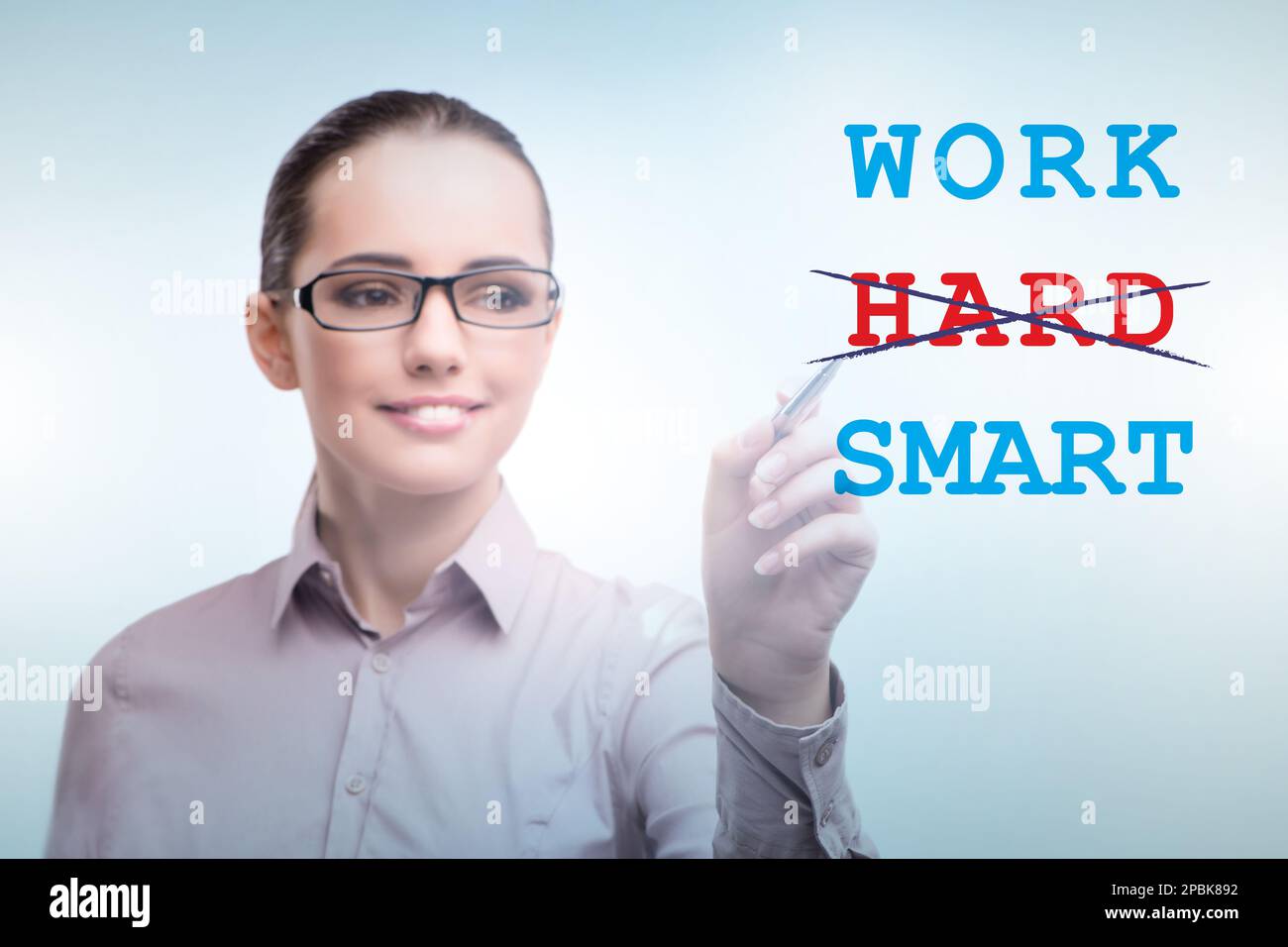 Businesswoman in the working smart not hard concept Stock Photo - Alamy