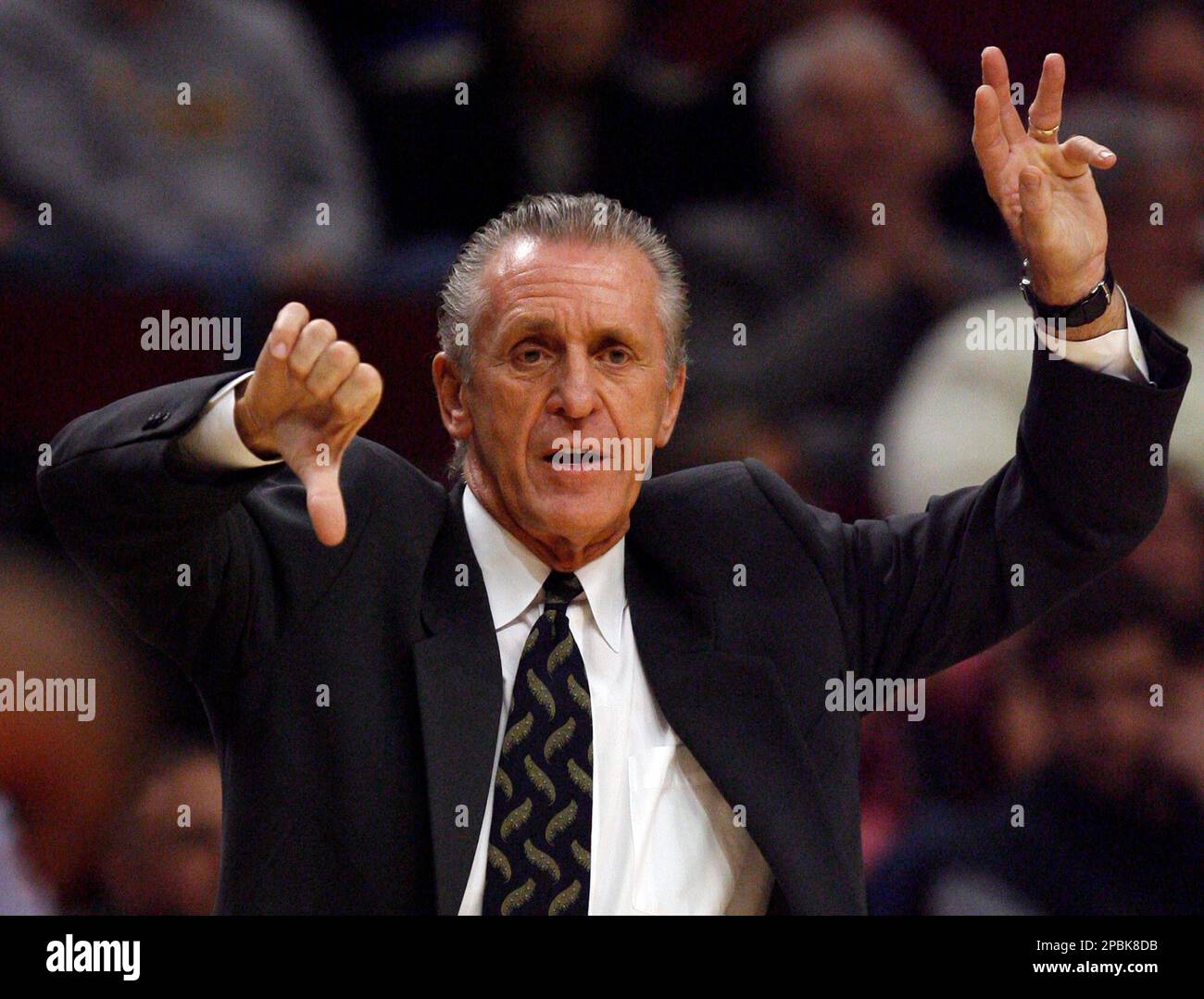 Miami Heat coach Pat Riley directs his team during the first quarter in ...